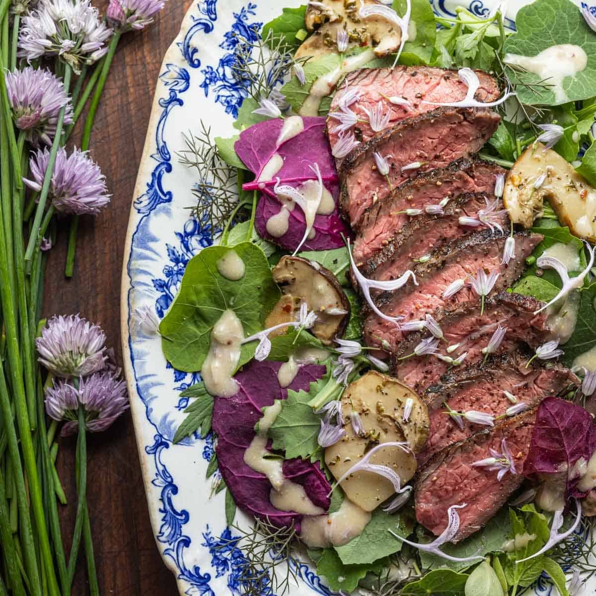 Beef Tagliata: Italian Steak Salad with Chive Blossom Dressing